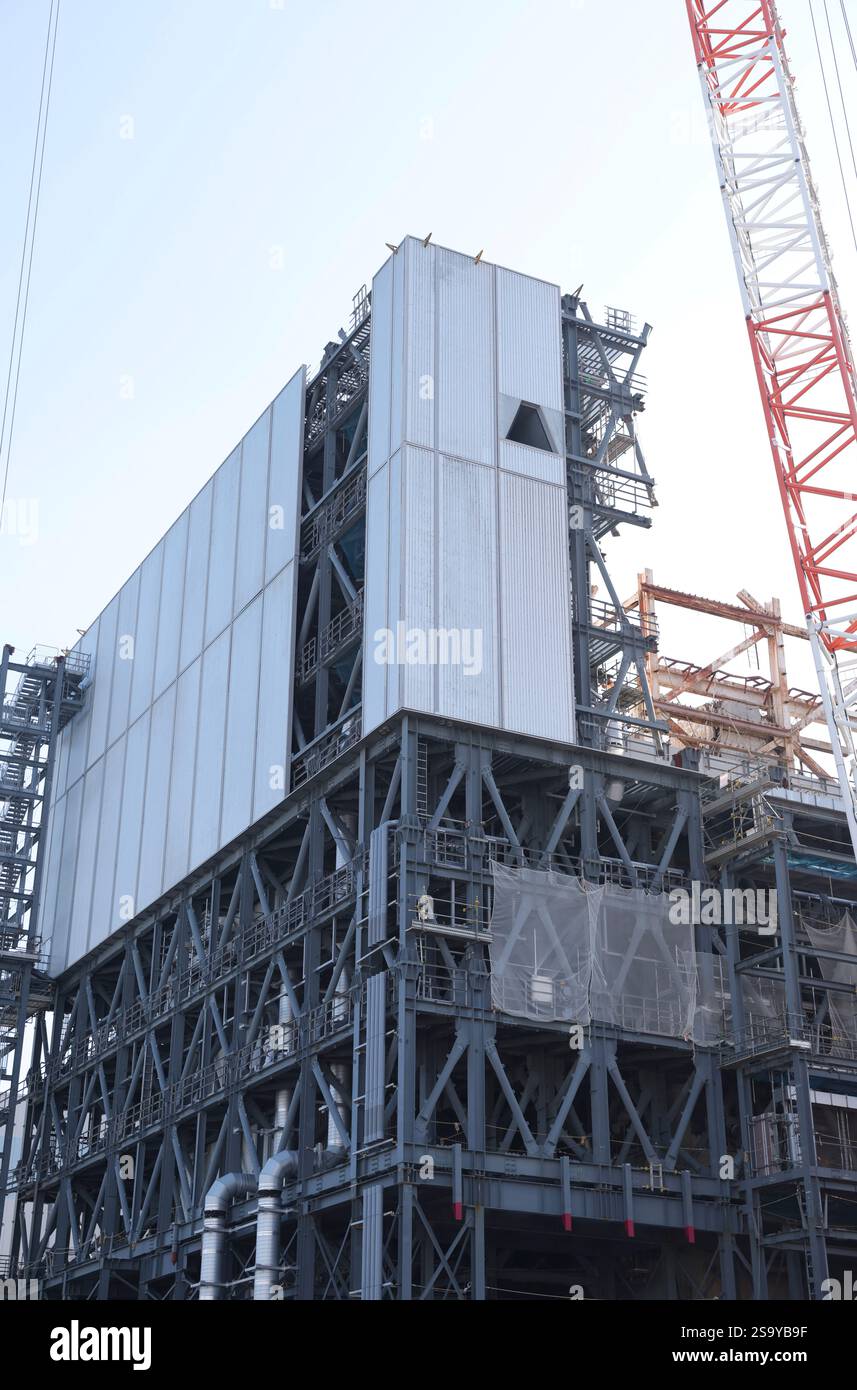 A photo shows the Fukushima Daiichi Nuclear Power Plant Unit 1, where a ...