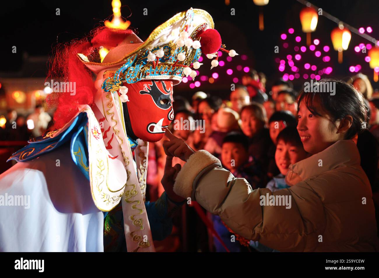 Beijing, China. 26th Jan, 2025. An audience interacts with a Chuan ...