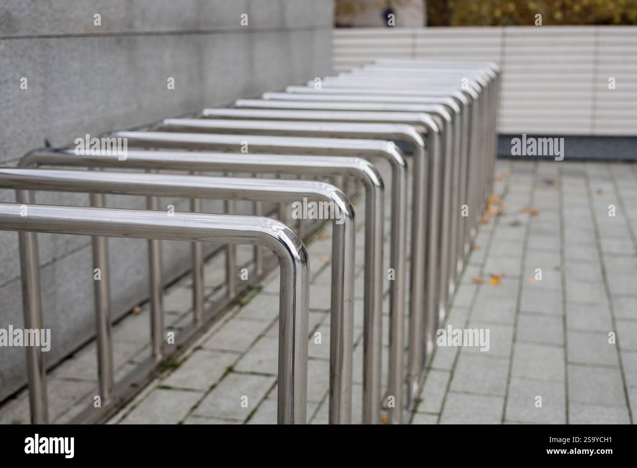Public stainless steel bicycle racks. empty bicycle parking lot Stock ...