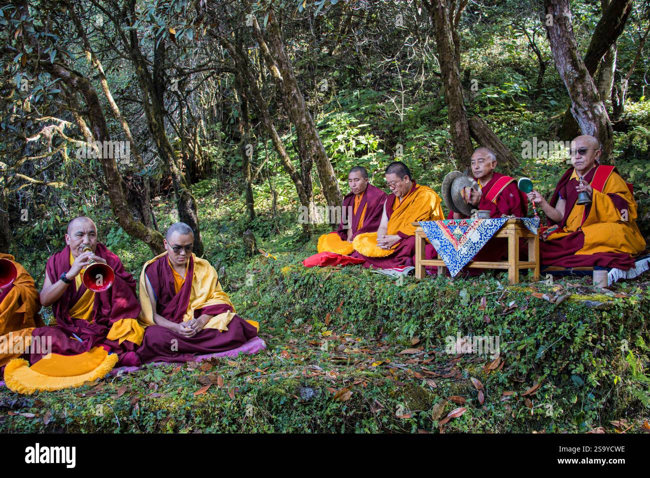 Sang Sang Rimpoche conducts puja at the spring below Chiwong Monastery ...