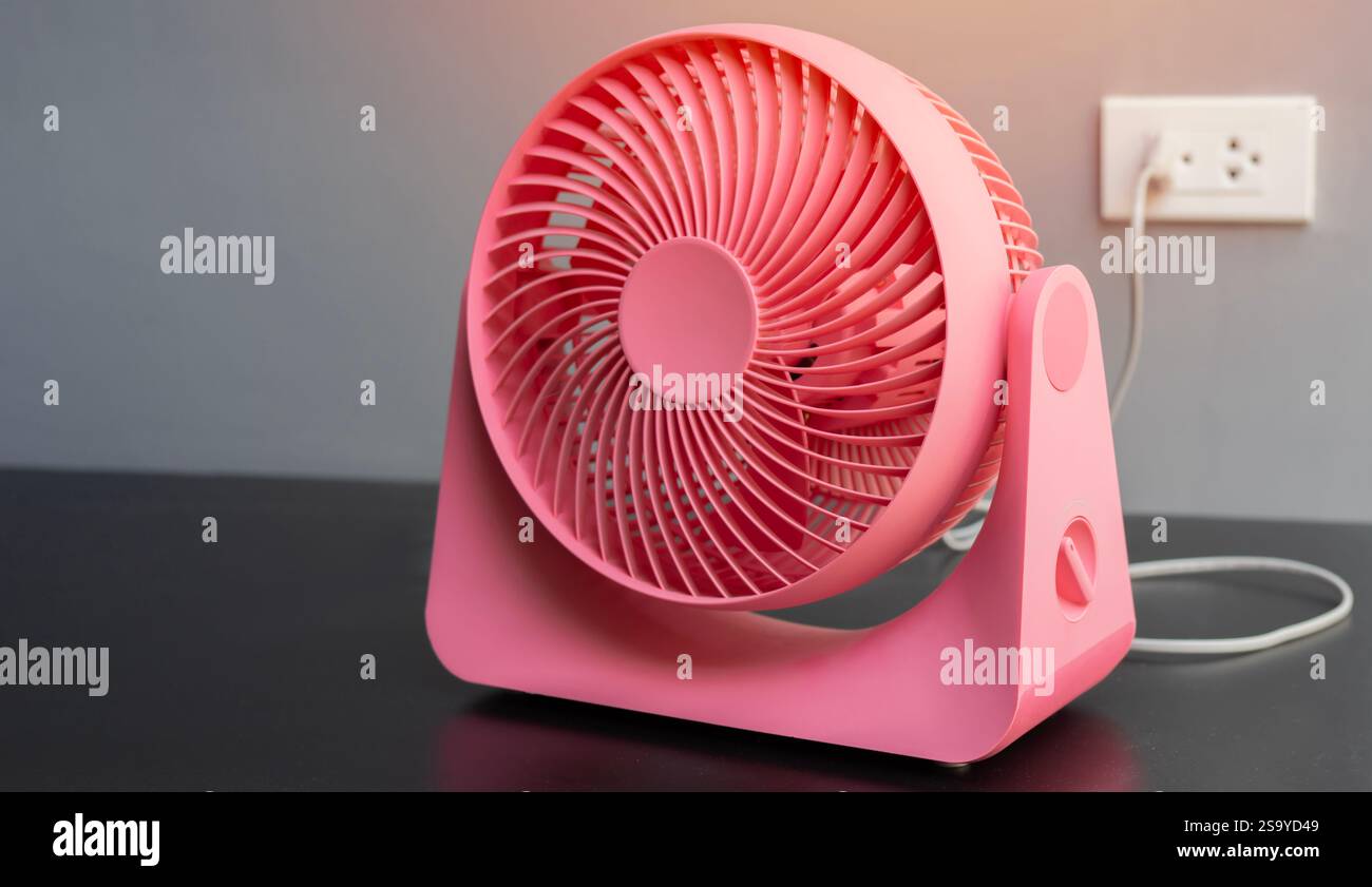 Desktop electrical fan pink hi-res stock photography and images - Alamy
