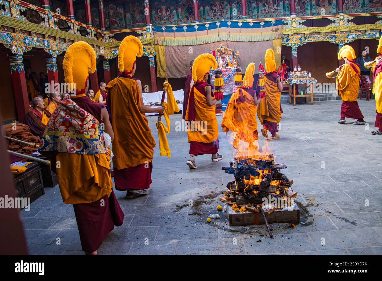 The Fire Puja (Jinsak) is performed at the Chiwong Monastery courtyard ...