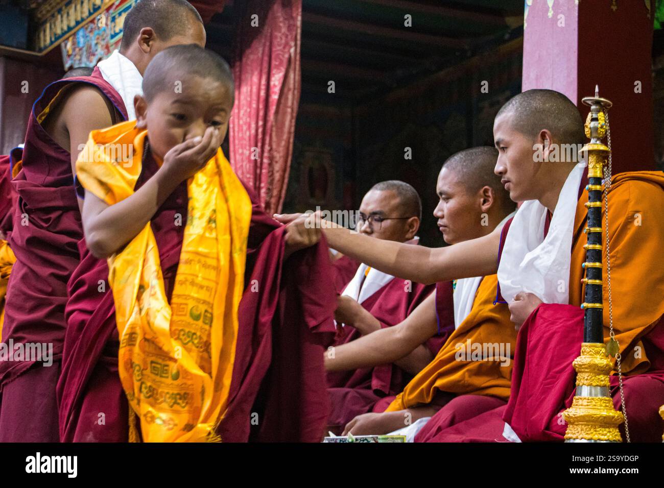 Pilgrims receive rilbu pills at the Empowerment (Wong) during Mani ...