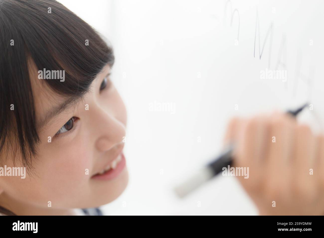 Secondary school students writing on whiteboard Stock Photo - Alamy