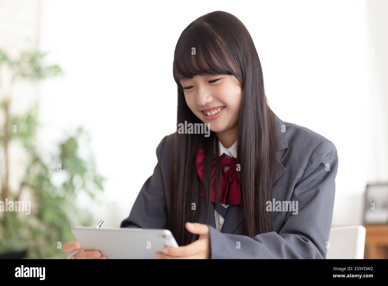 Junior high school students studying at home Stock Photo - Alamy