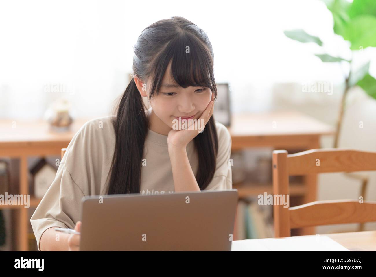 Junior high school students studying at home Stock Photo - Alamy