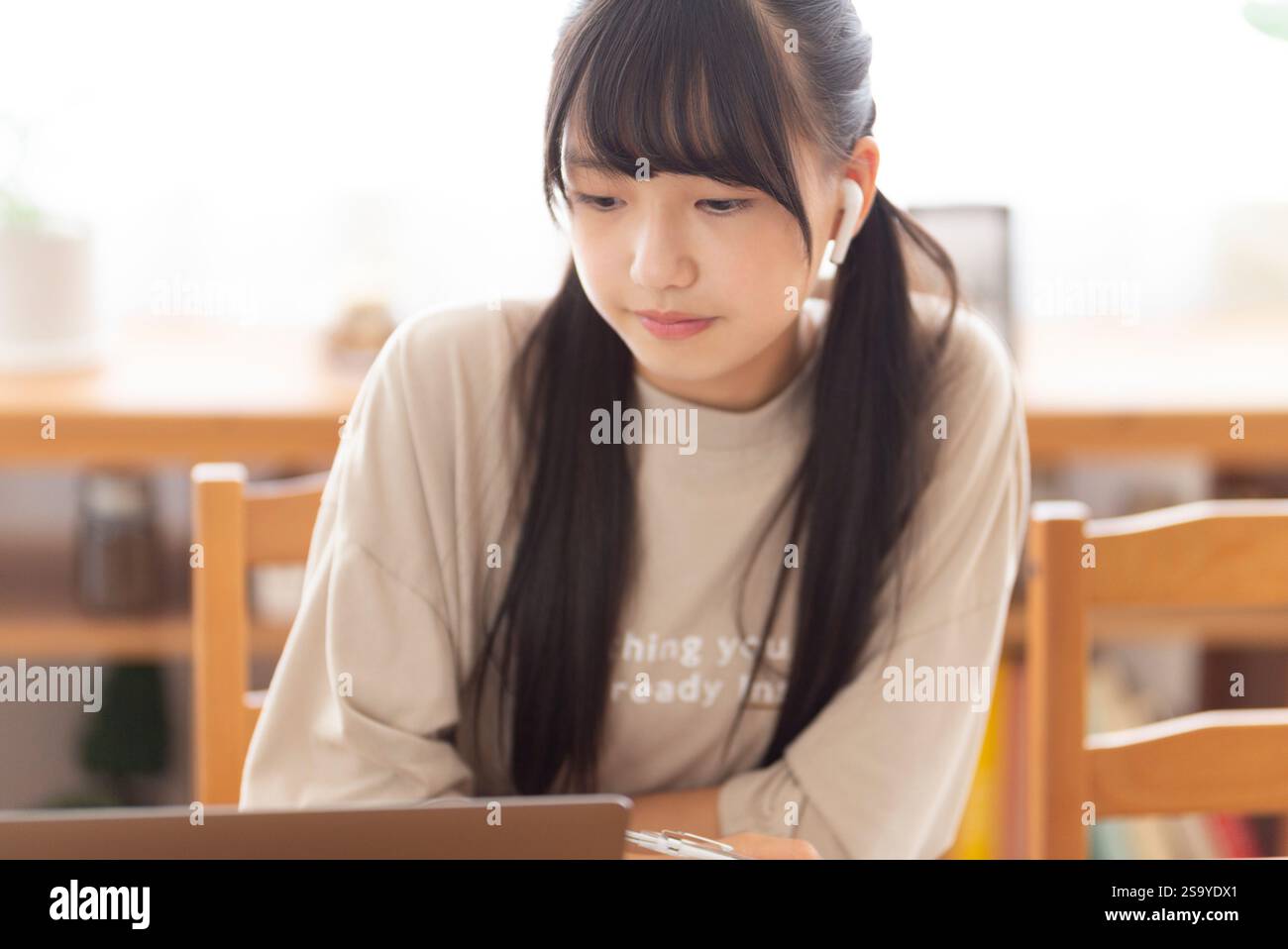 Junior high school students studying at home Stock Photo - Alamy