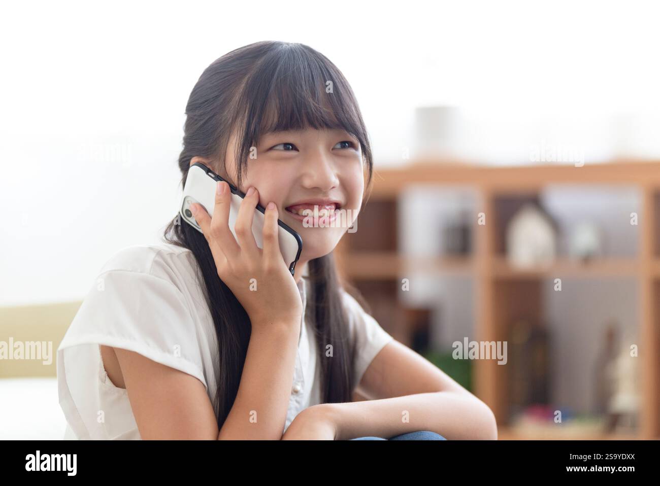 Secondary school student making a phone call Stock Photo - Alamy