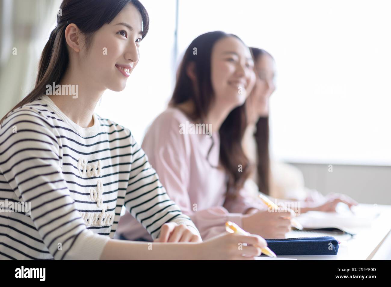 University students attending a lecture Stock Photo - Alamy