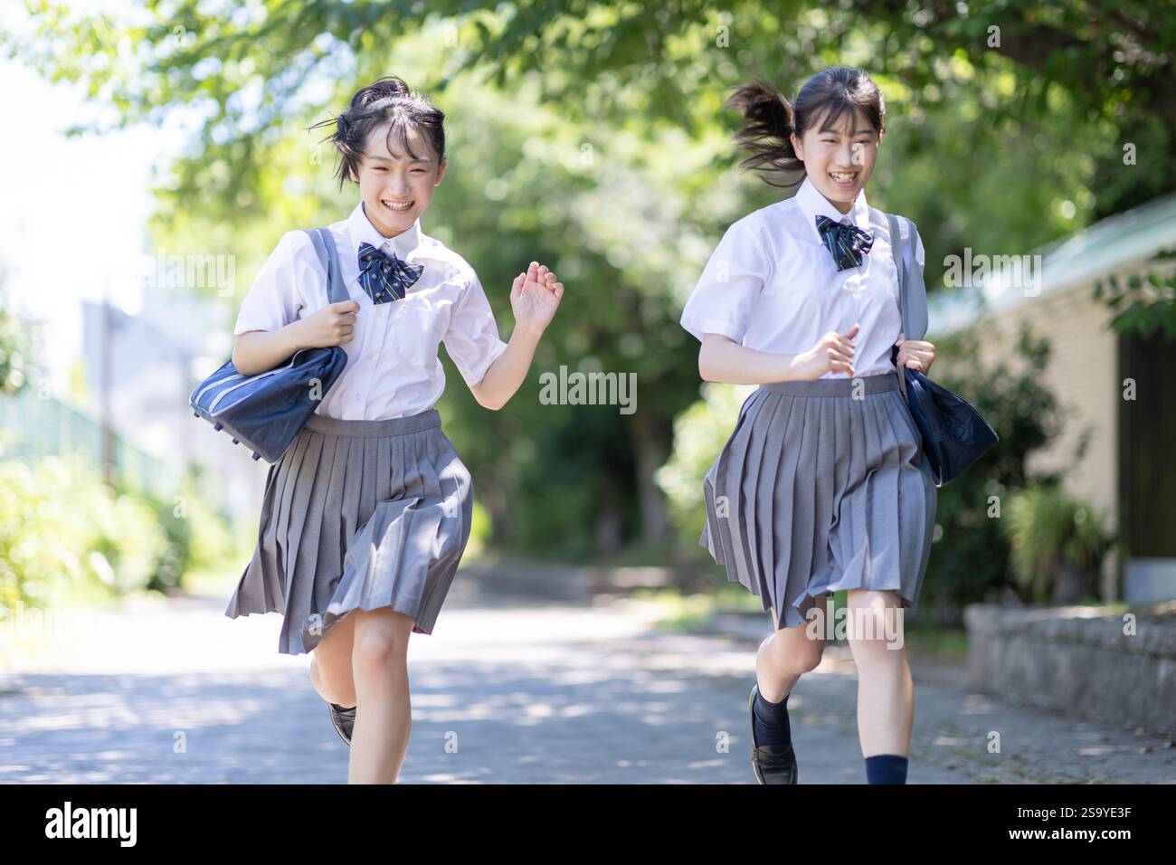 Running home after school hi-res stock photography and images - Alamy