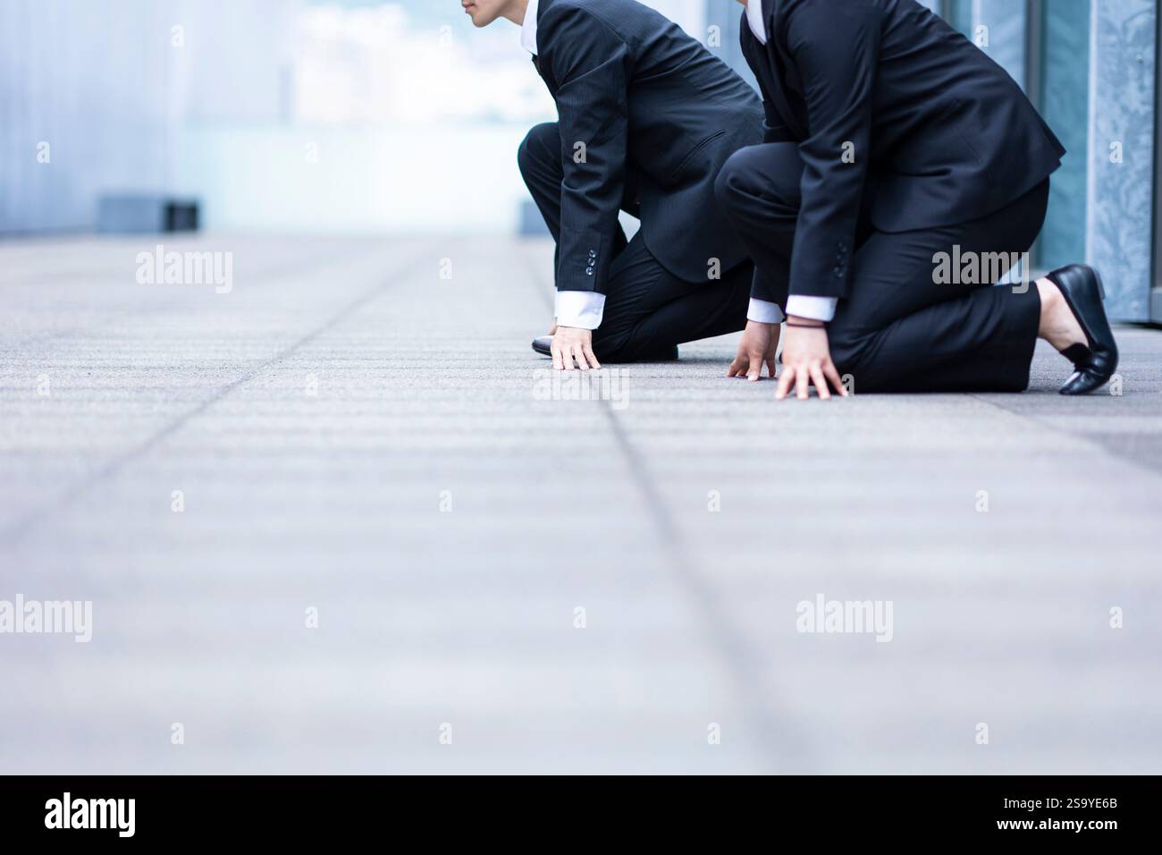 Men and women lining up at the start line Stock Photo - Alamy