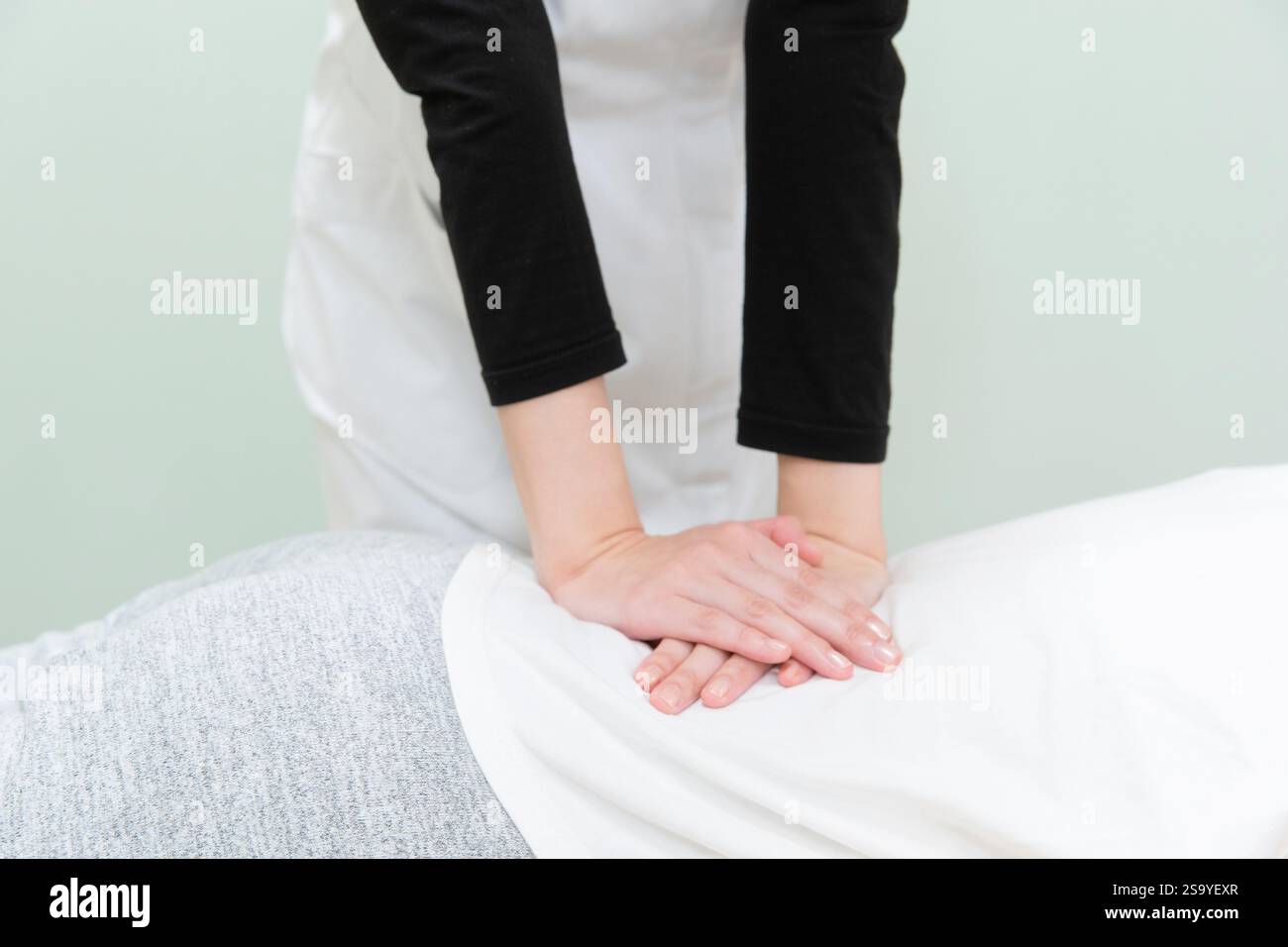Bodywork, massage, lower back and pelvis Stock Photo - Alamy
