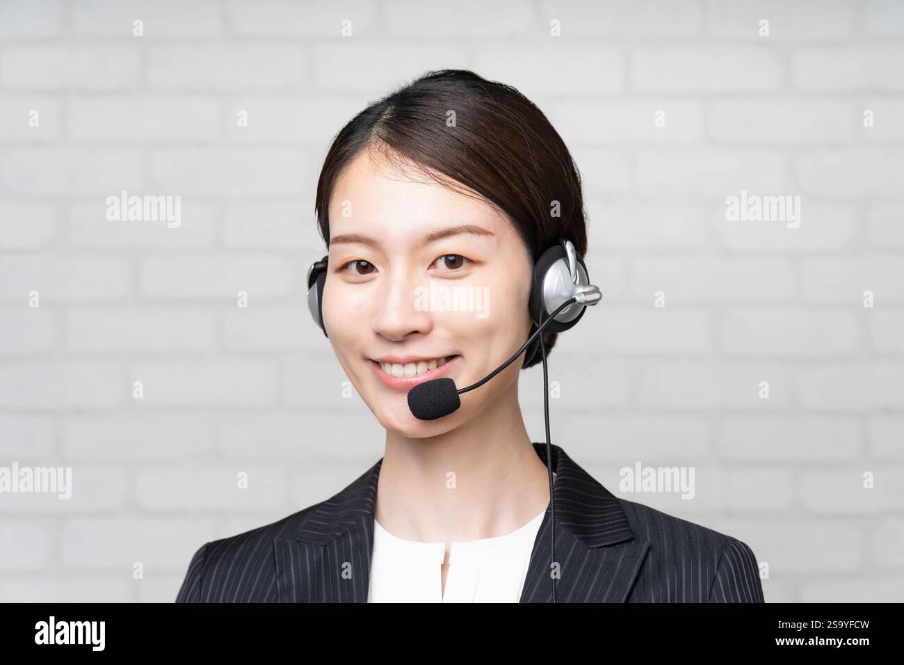 Operator wearing headset Stock Photo - Alamy