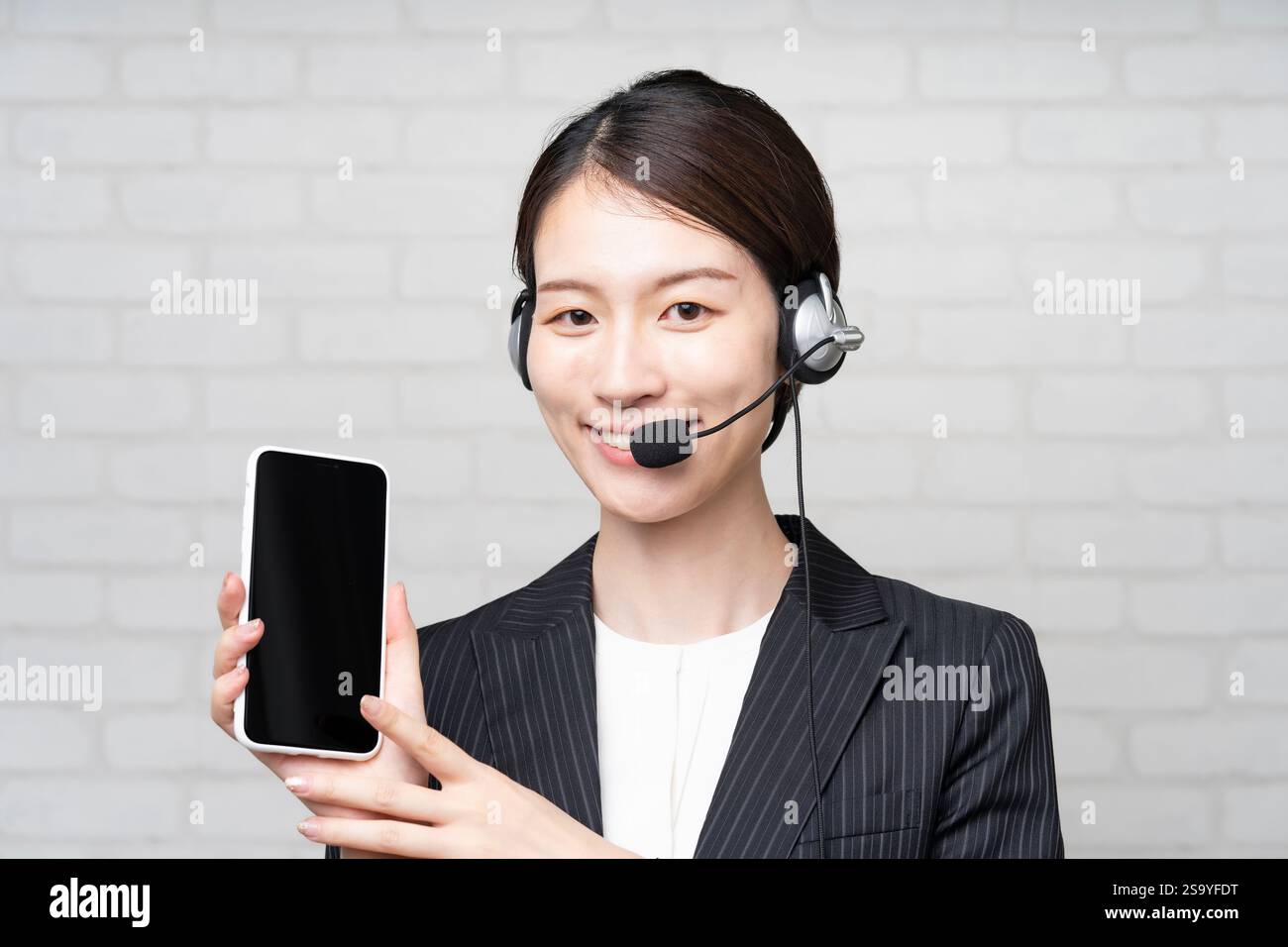 Operator wearing headset Stock Photo - Alamy