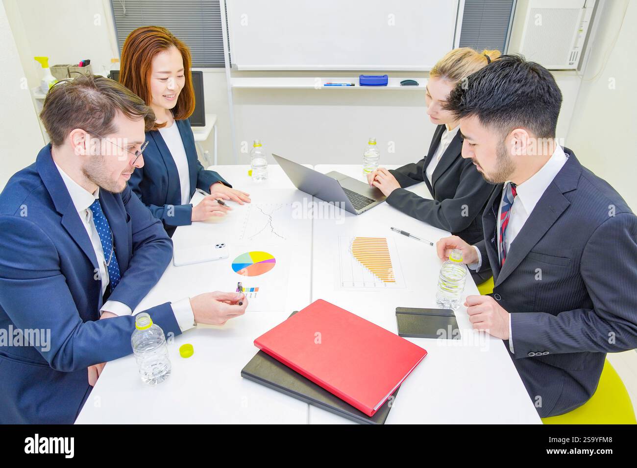 Business people having a discussion in a conference room Stock Photo ...