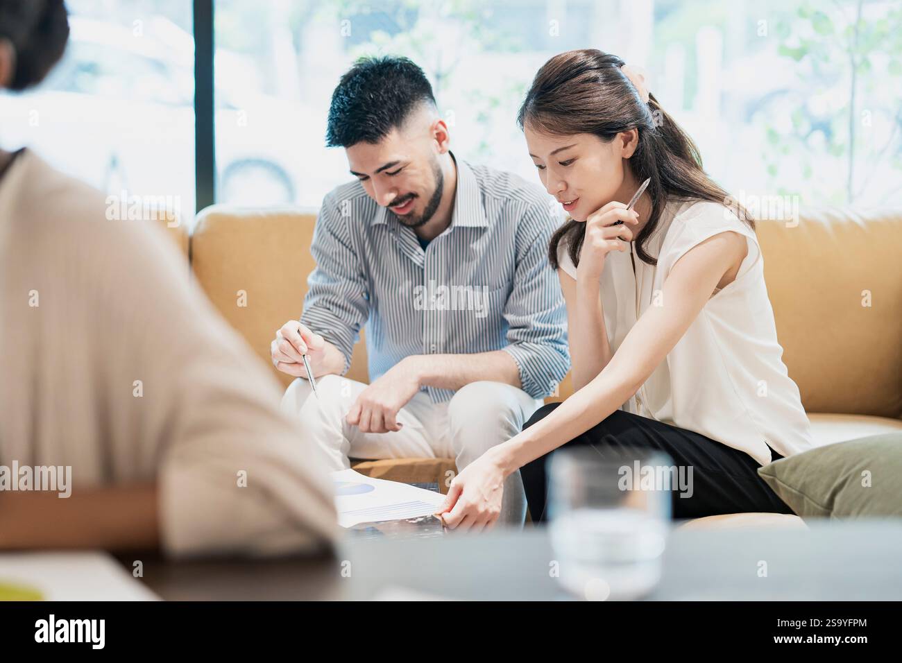 A snapshot of the business scene with young multinational members Stock ...