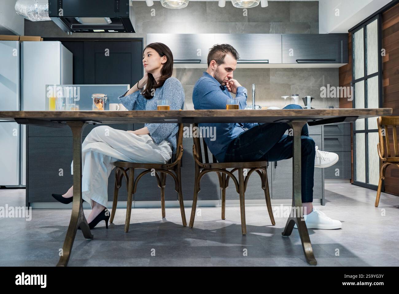 Man and woman with a grim look on their faces after a fight Stock Photo ...