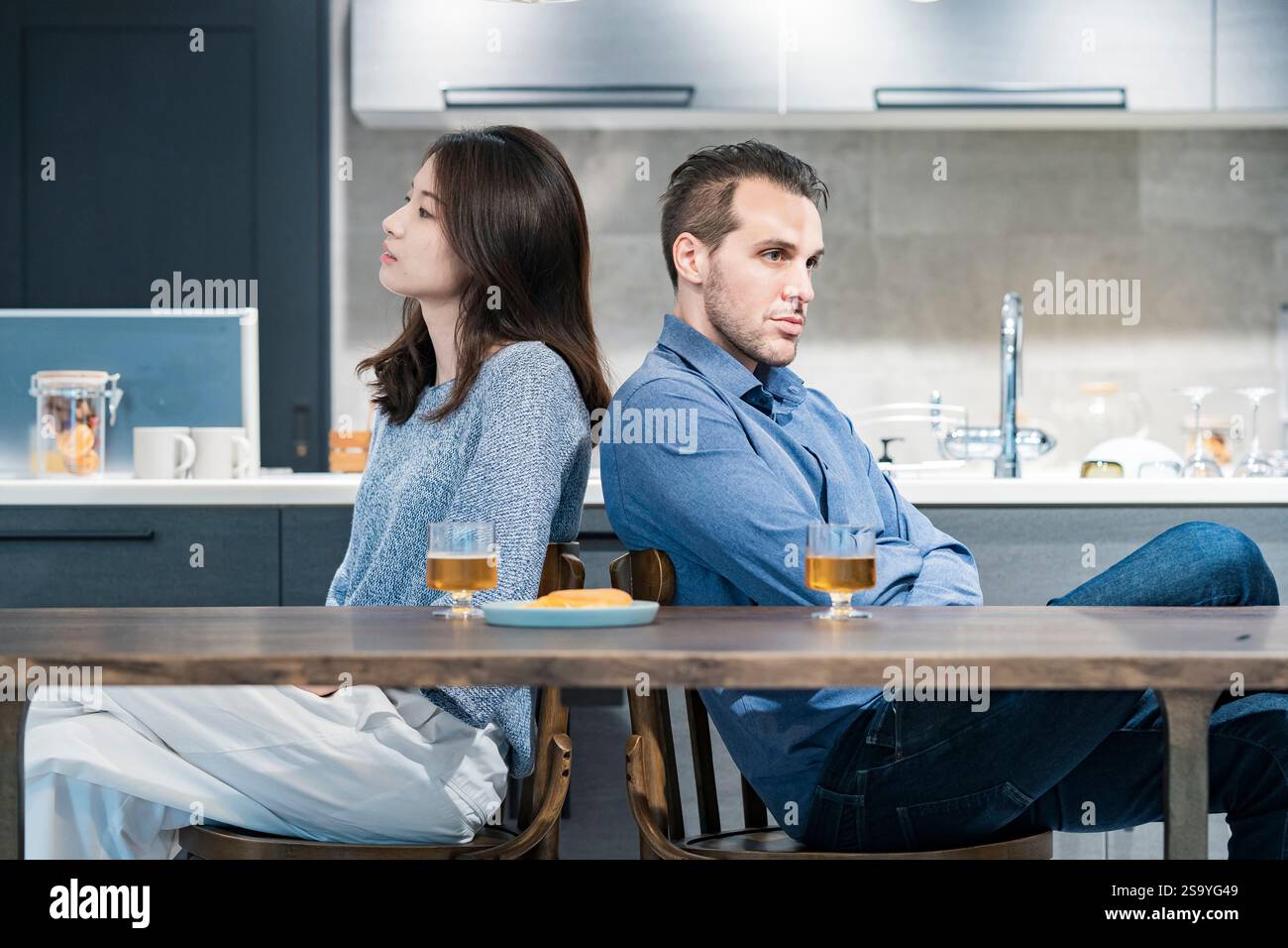 Man and woman with a grim look on their faces after a fight Stock Photo ...