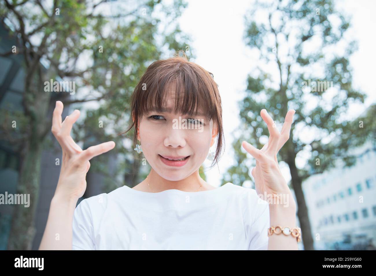 Woman looking shocked and sad Stock Photo - Alamy