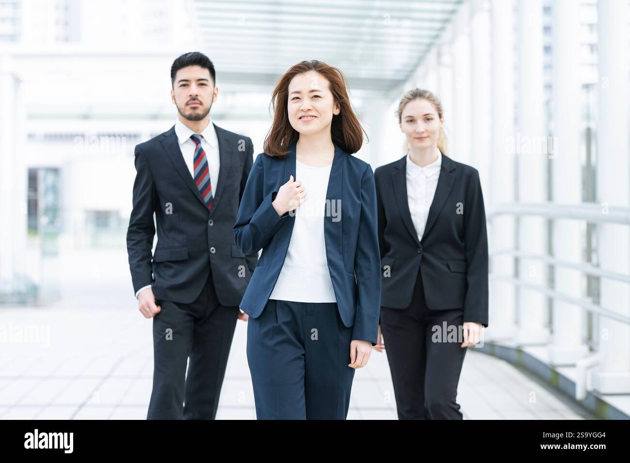 International business team Stock Photo - Alamy