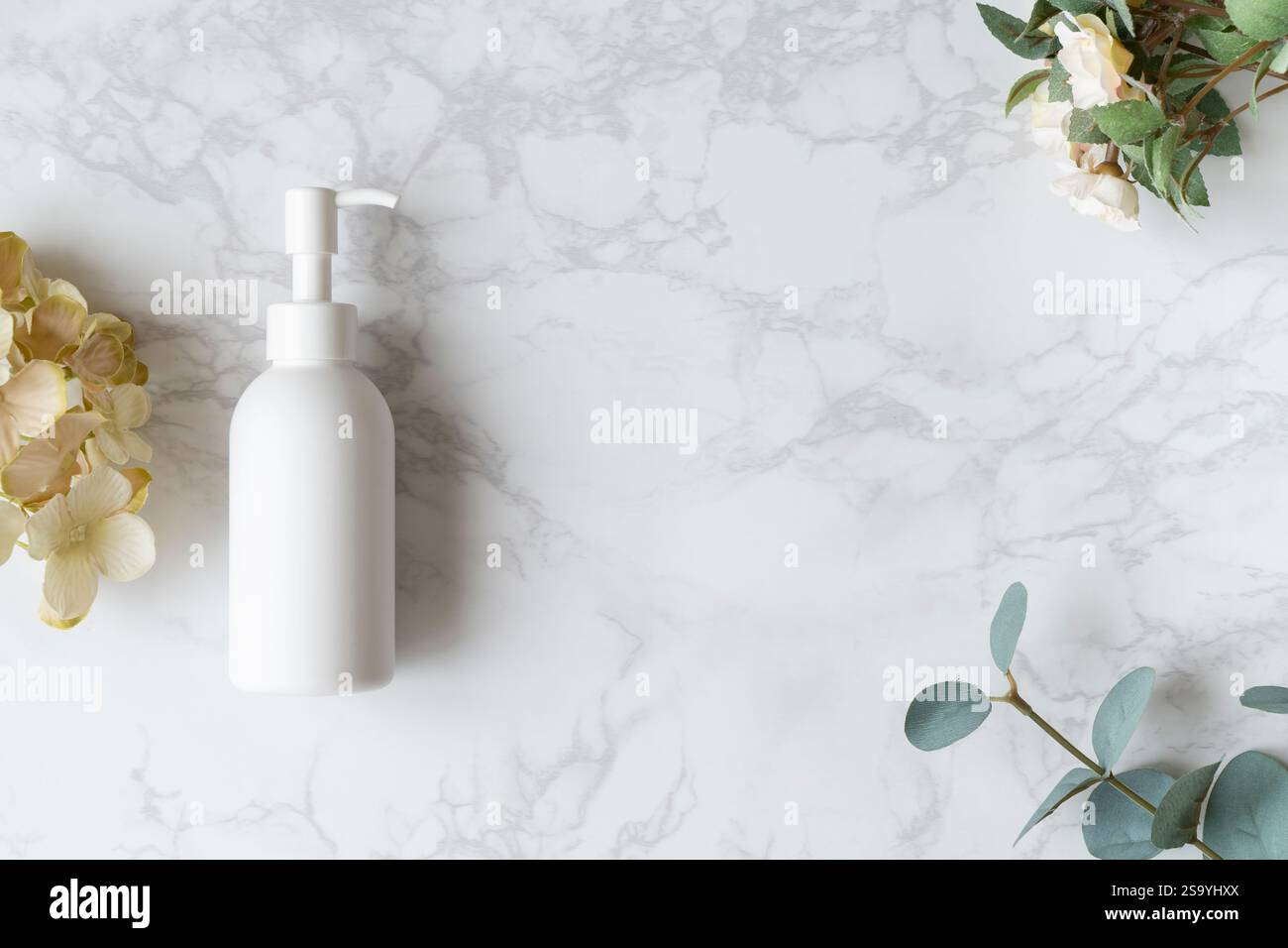 Spray bottle on marble slab (left side of screen Stock Photo - Alamy
