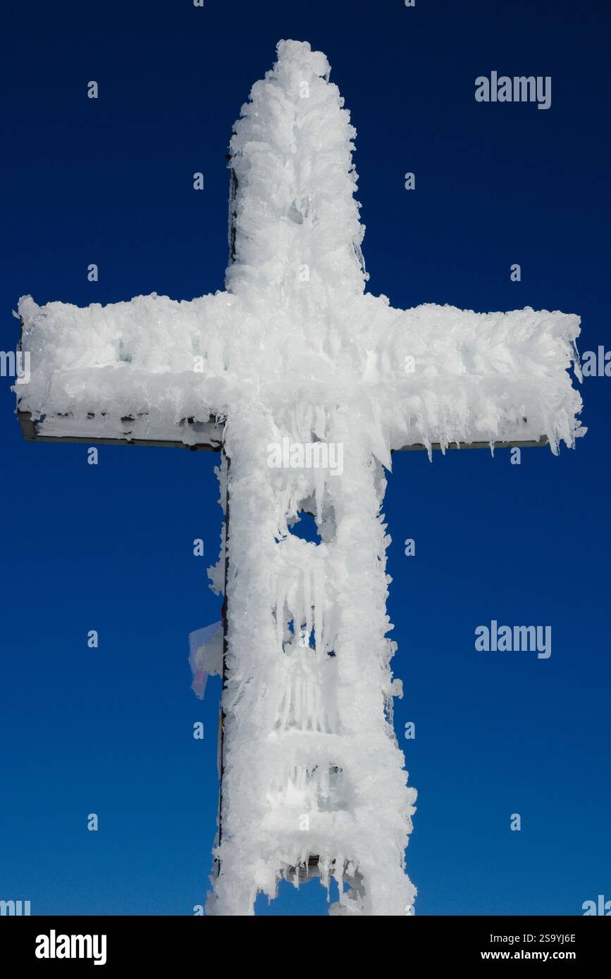 Frozen cross on the top of mount Pizzo Arera (2,512 metres - 8,241 ft ...