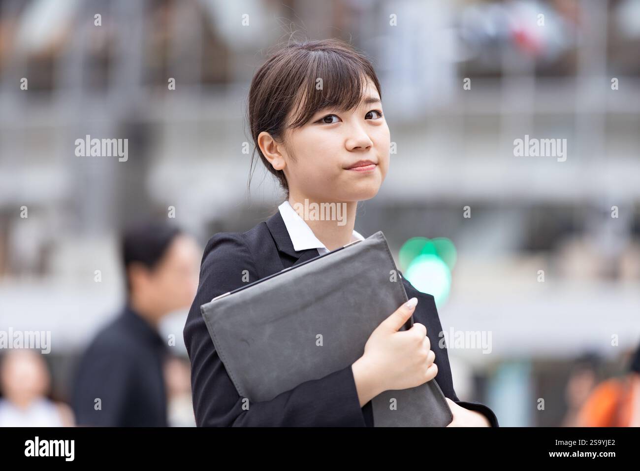 Newcomer commuting to work, image of job search Stock Photo - Alamy