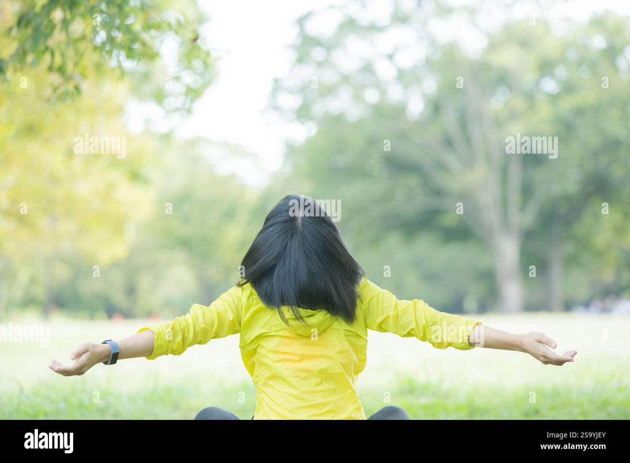 Woman taking a deep breath during exercise Stock Photo - Alamy