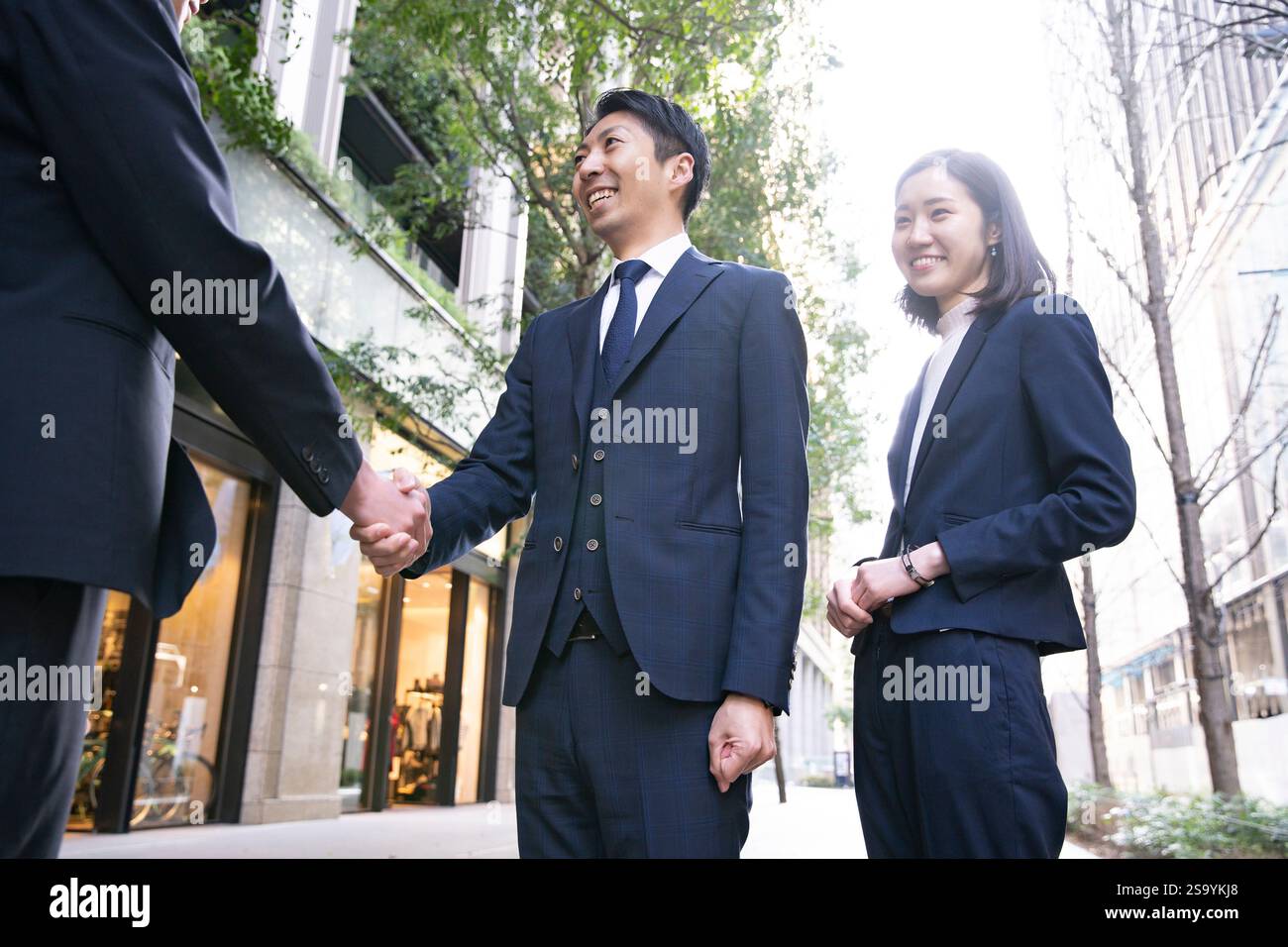 Business scene - handshake Stock Photo - Alamy