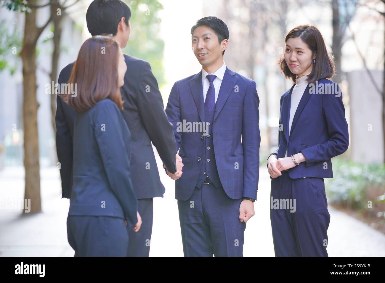 Business scene - handshake Stock Photo - Alamy