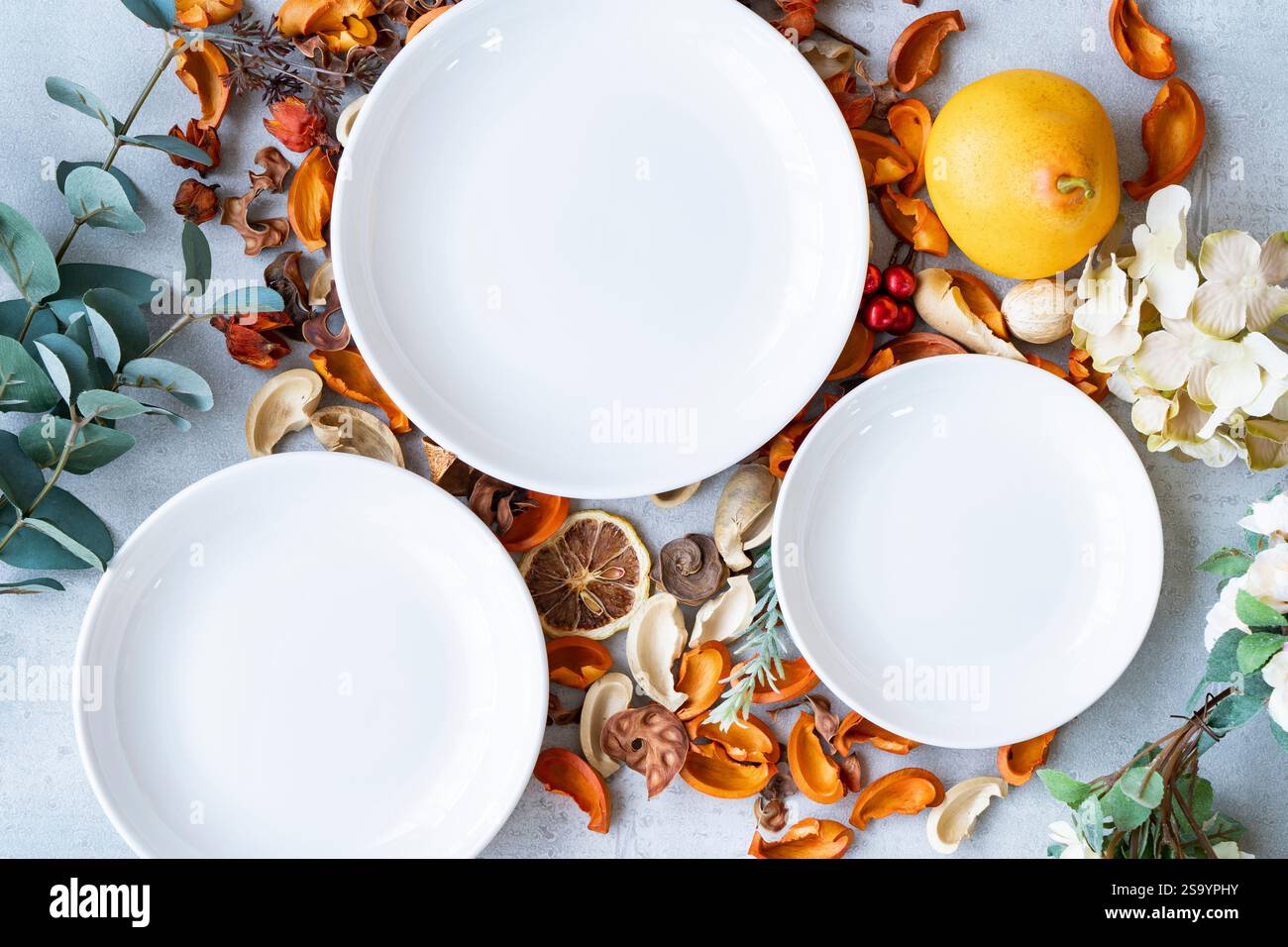 Table photo with plates Stock Photo - Alamy