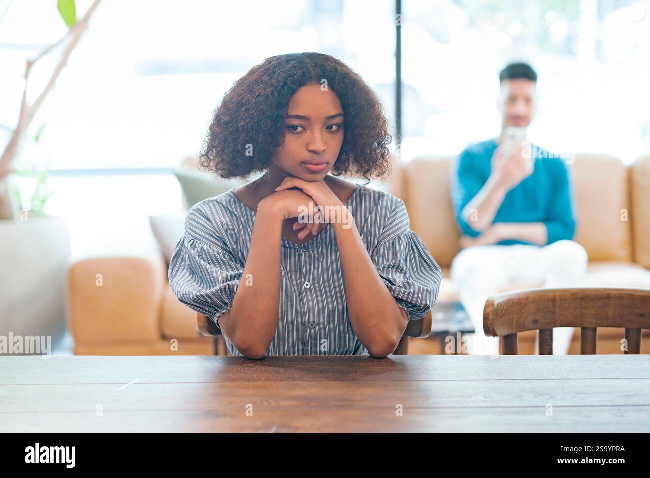Man and woman with a grim look on their faces after a fight Stock Photo ...