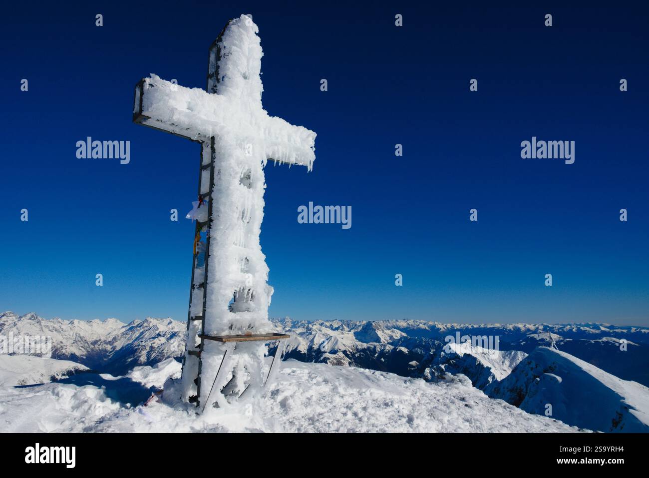 Frozen cross on the top of mount Pizzo Arera (2,512 metres - 8,241 ft ...