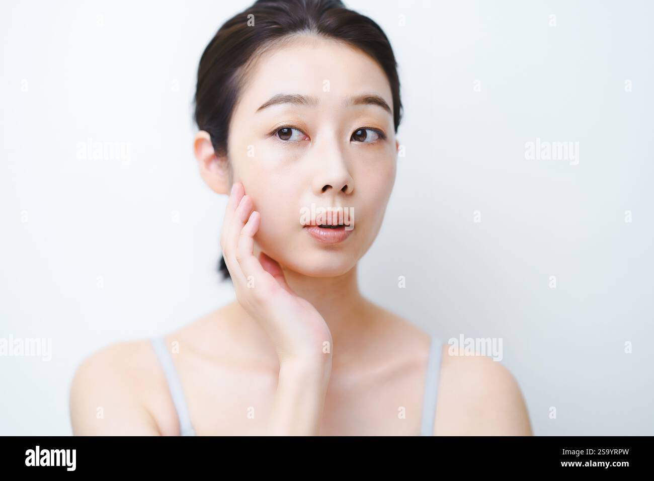 Woman concerned about skin condition Stock Photo - Alamy