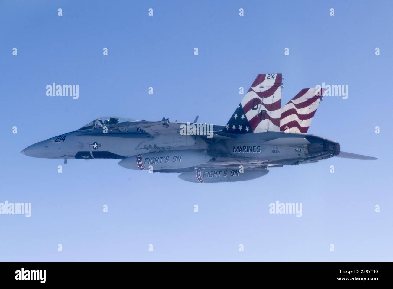 A U.S. Marine Corps F/A-18C Hornet aircraft with Marine Fighter Attack ...