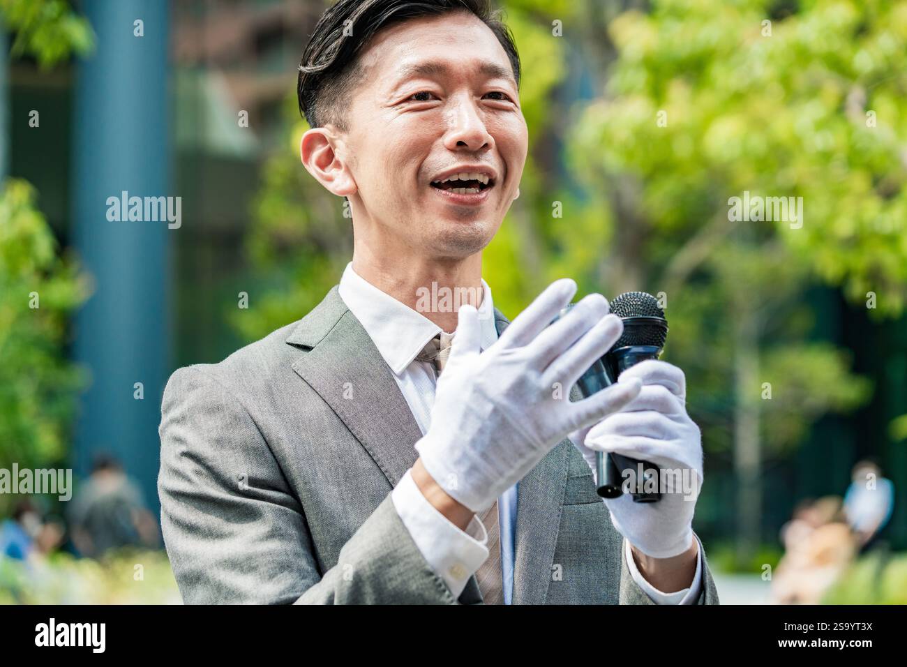 Image of election candidate speaking on the street Stock Photo - Alamy