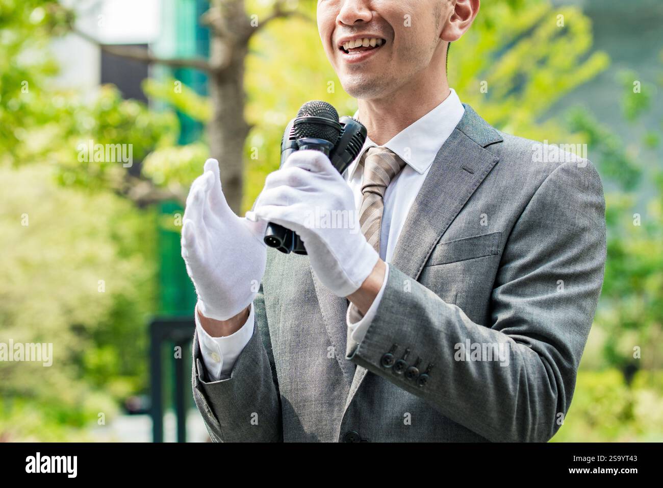 Image of election candidate speaking on the street Stock Photo - Alamy