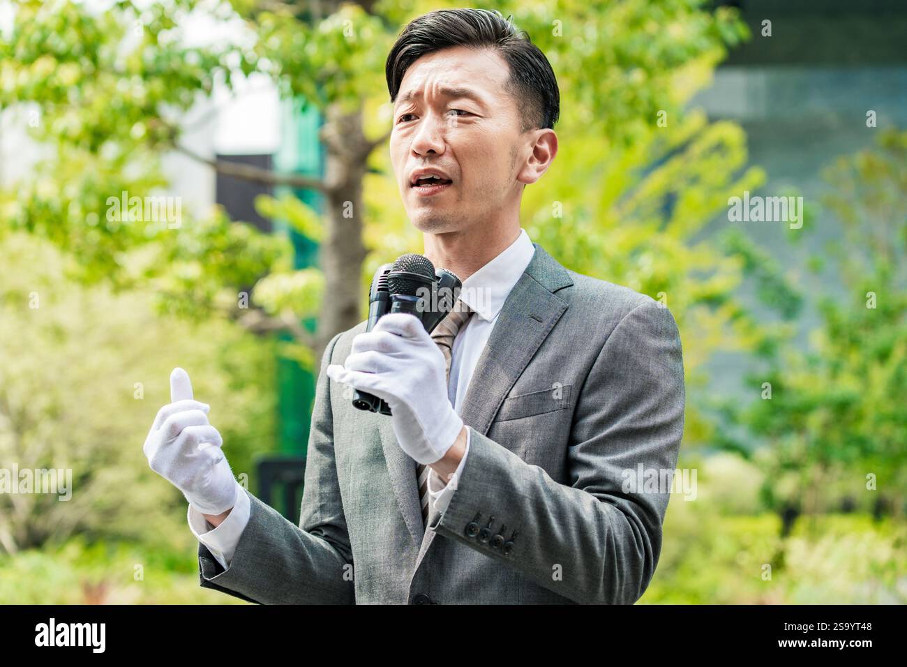 Image of election candidate speaking on the street Stock Photo - Alamy