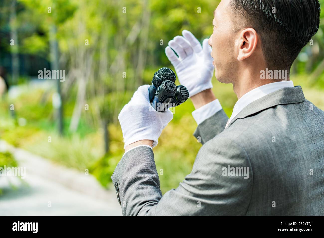 Image of election candidate speaking on the street Stock Photo - Alamy