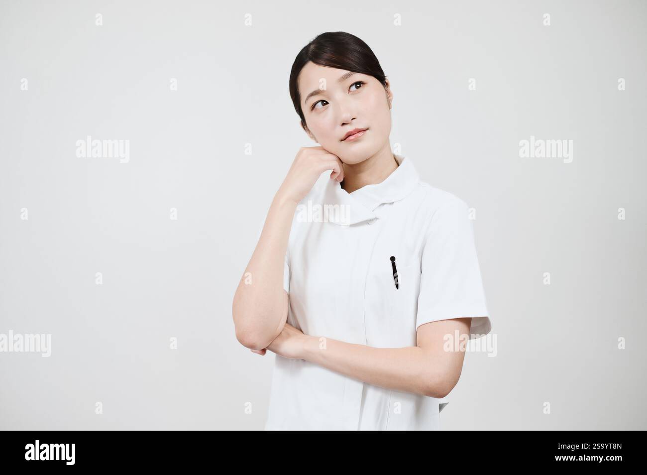 Woman in white in distress Stock Photo - Alamy