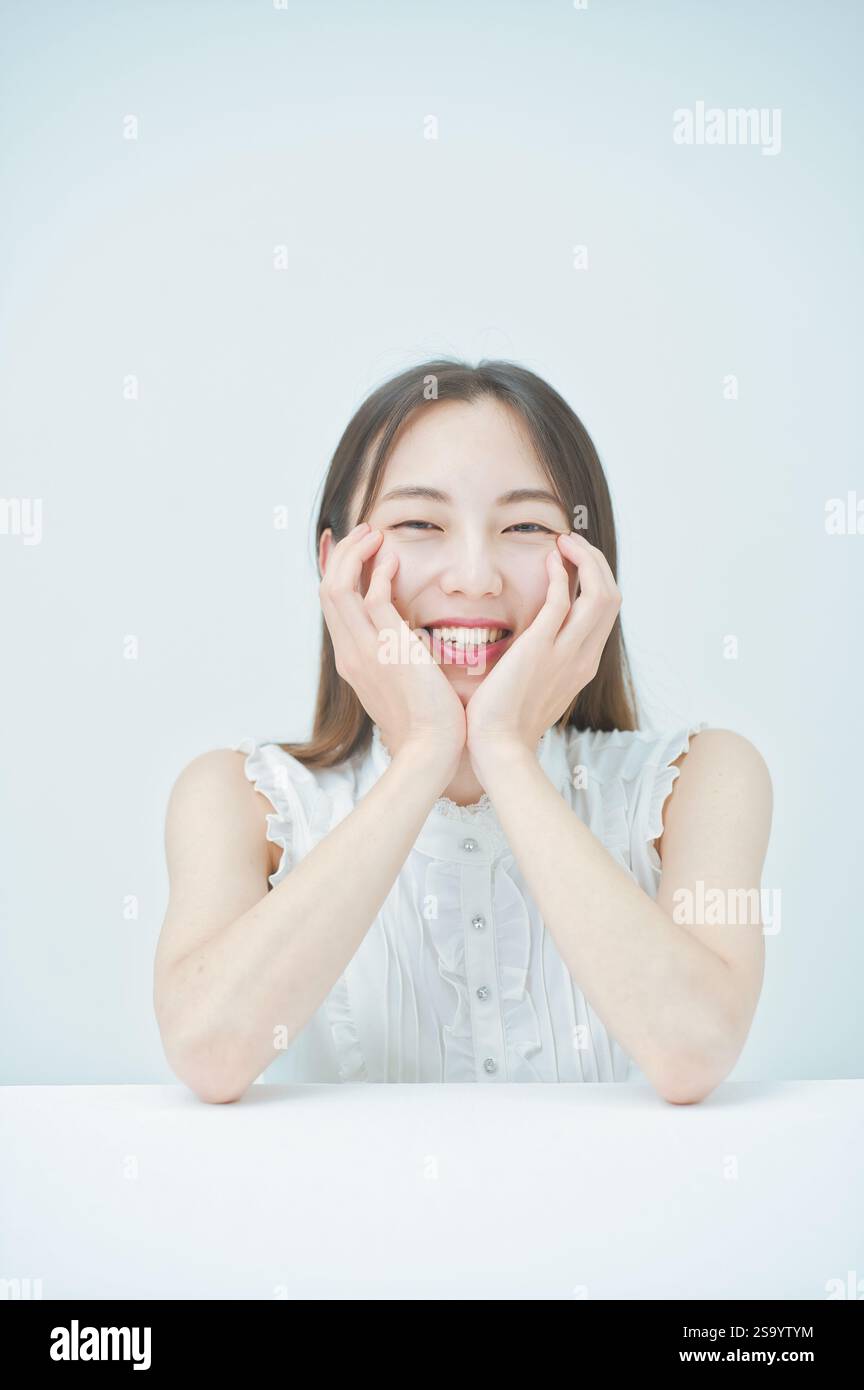 Young woman in elbow pose Stock Photo - Alamy