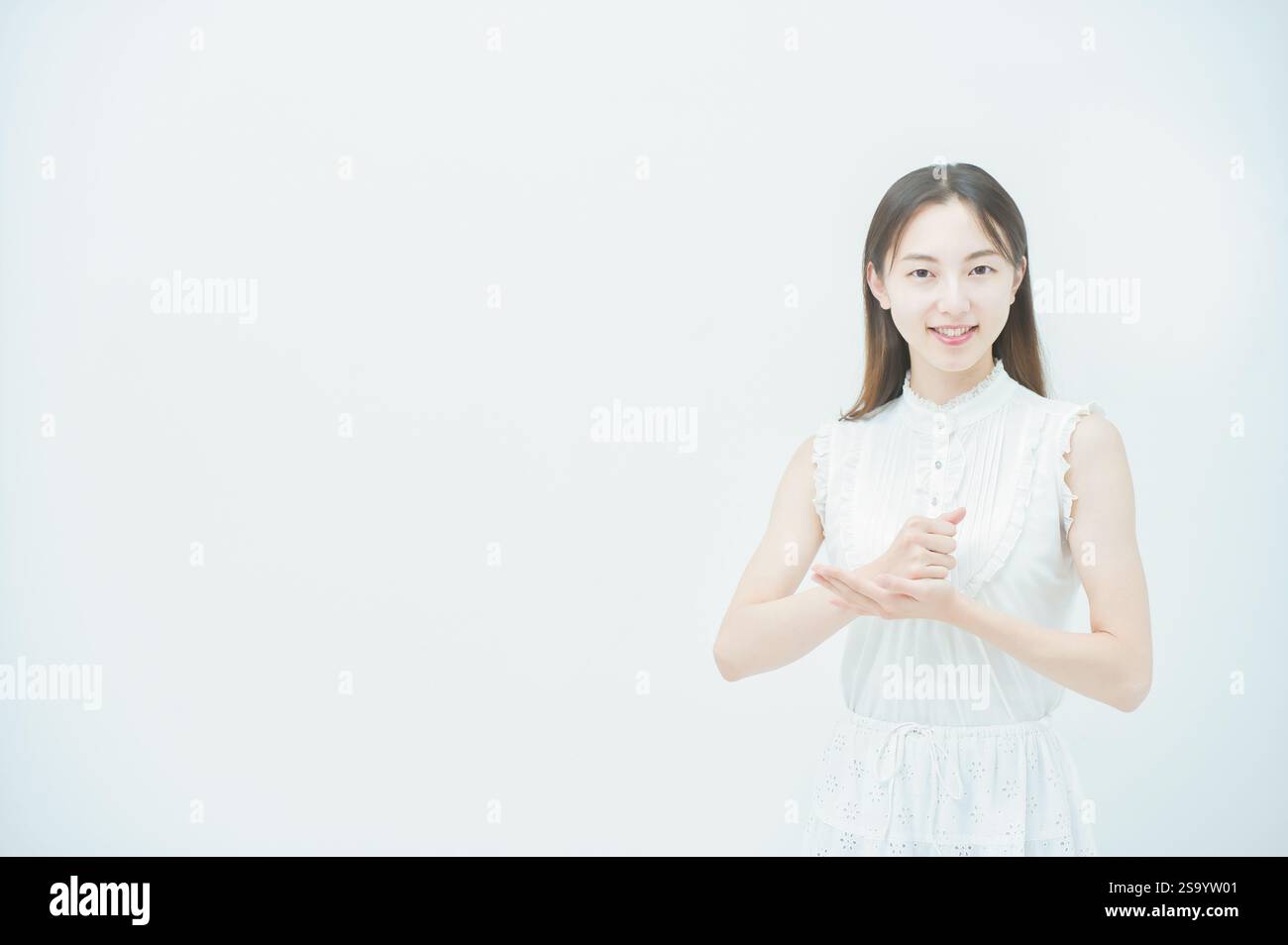 Young woman in inspirational pose Stock Photo - Alamy