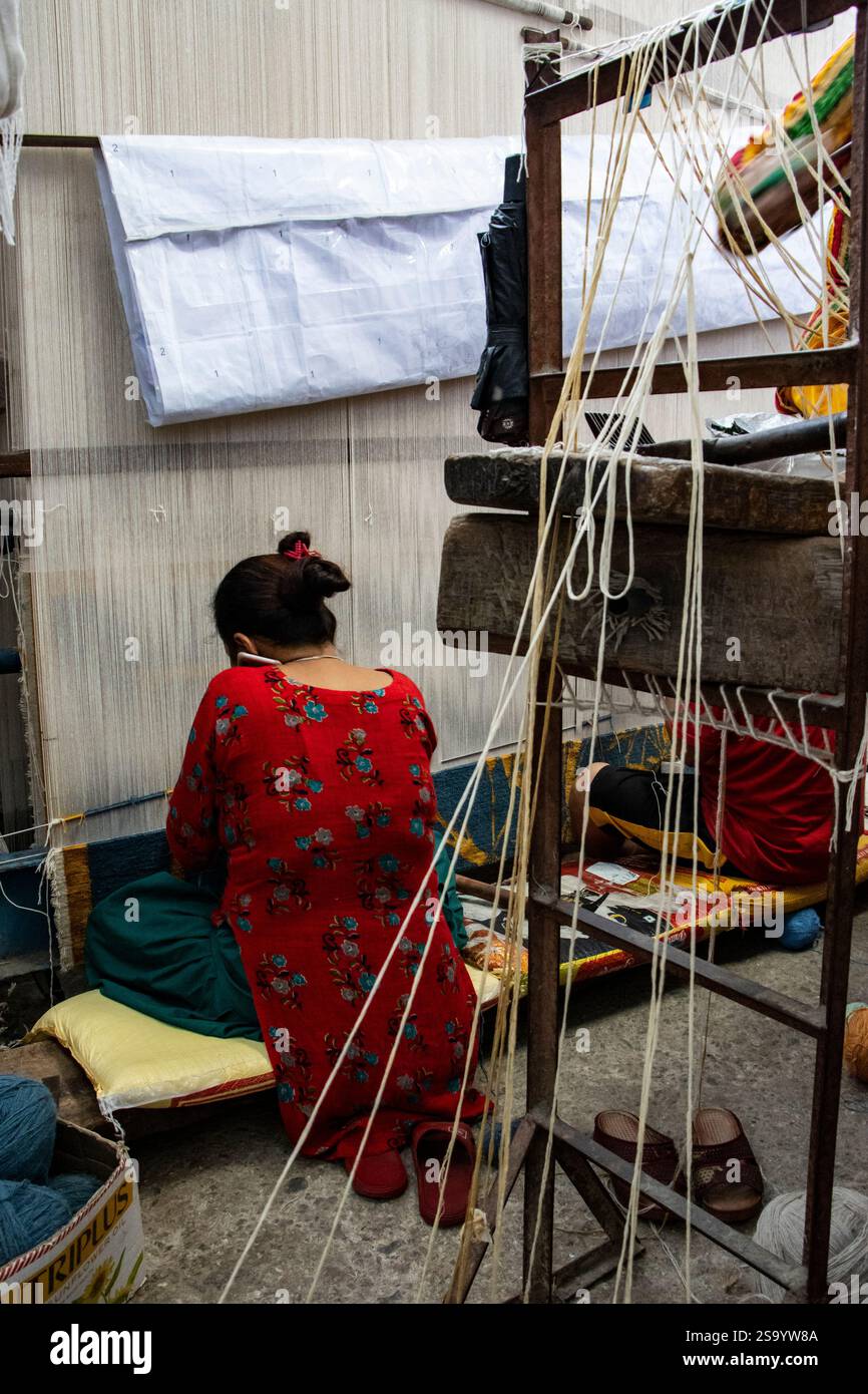 Carpet Factory workers weaving carpets. Bouddha, Kathmandu, Nepal Stock ...