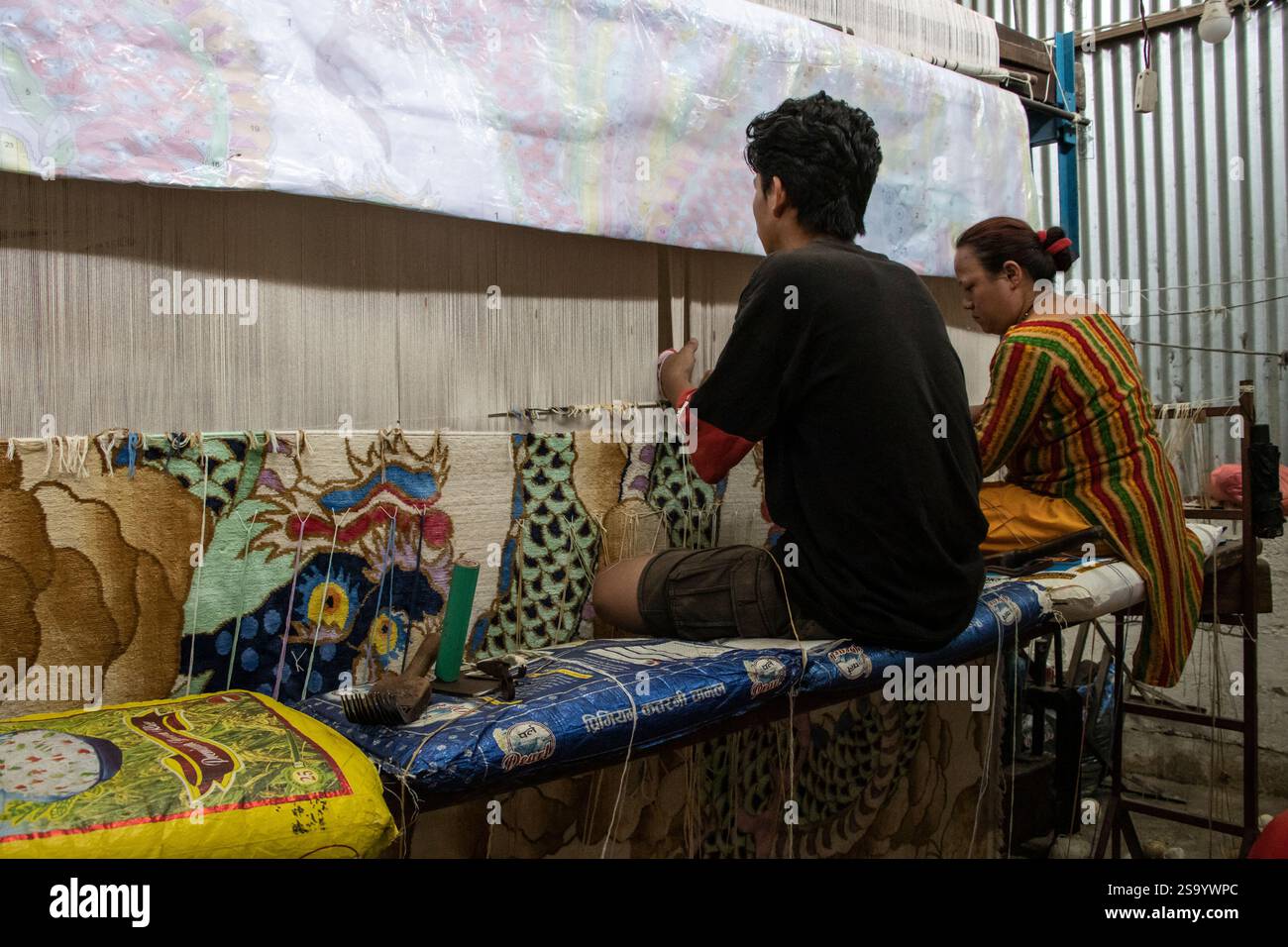 Carpet Factory workers weaving carpets. Bouddha, Kathmandu, Nepal Stock ...