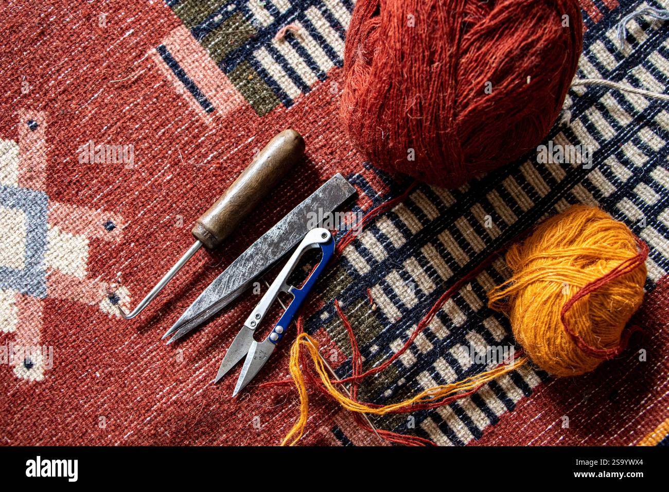 Carpet mending tools at Jorpati, Kathmandu, Nepal Stock Photo - Alamy