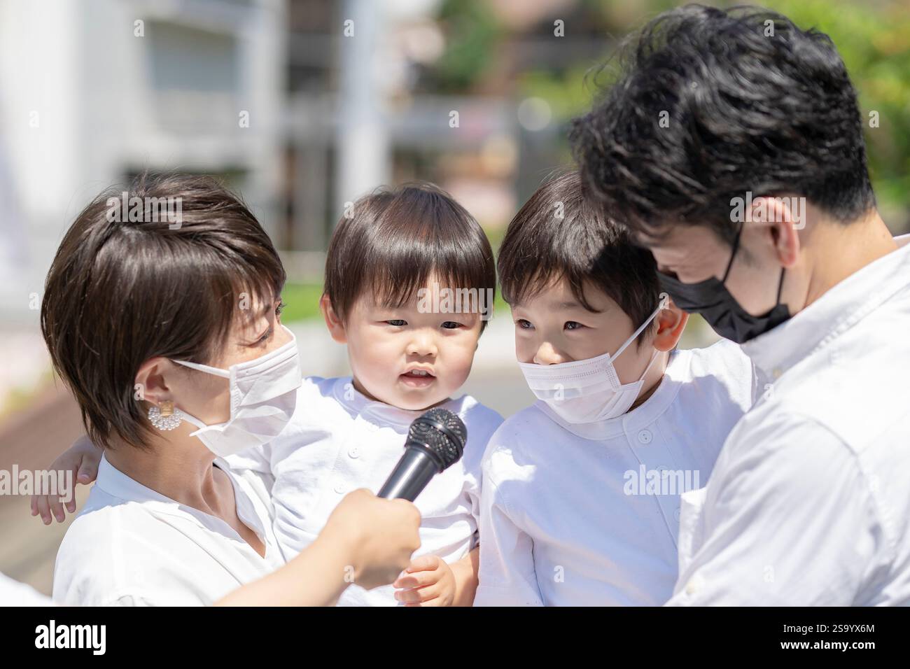 Child microphone interview hi-res stock photography and images - Alamy