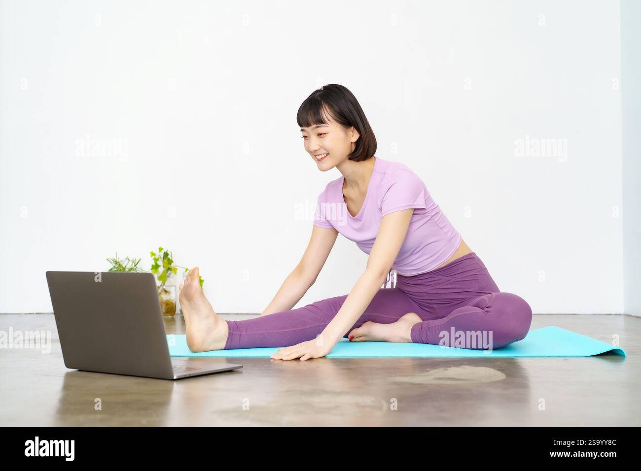 Online yoga lessons Stock Photo - Alamy