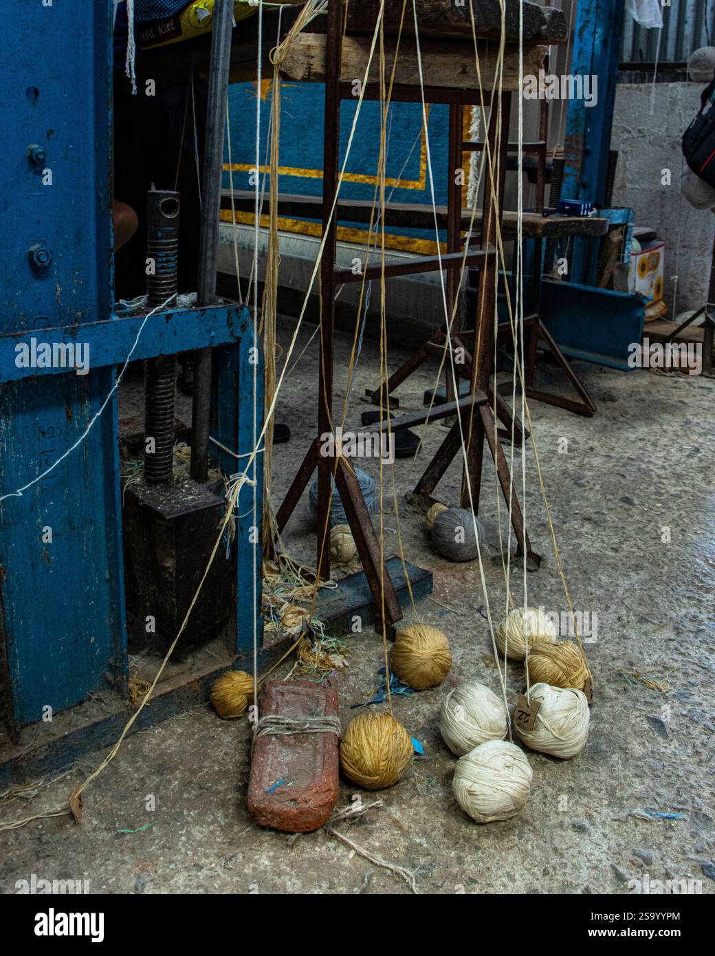 Carpet Factory workers spinning yarn. Bouddha, Kathmandu, Nepal Stock ...