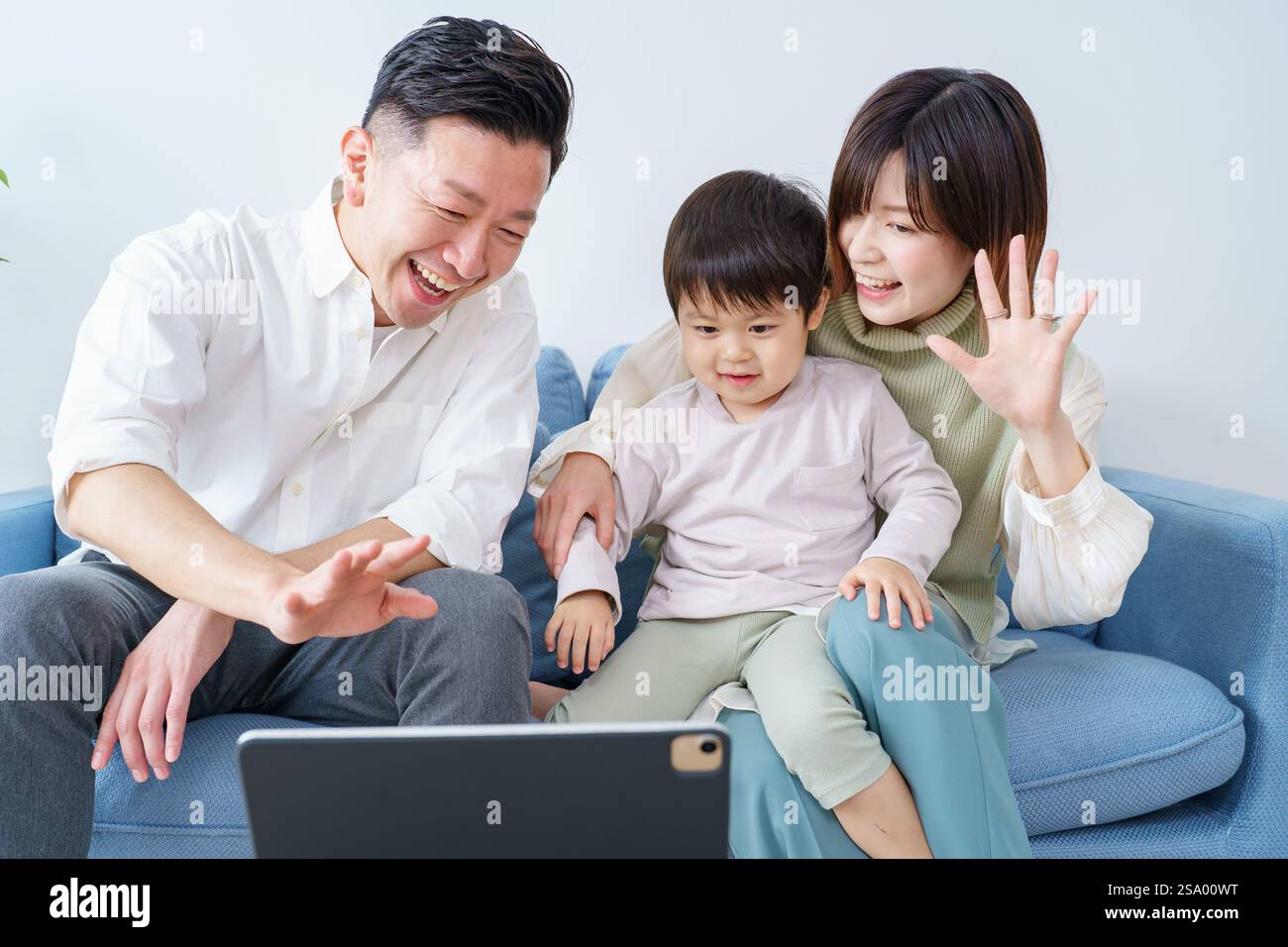 Boy waving from distance hi-res stock photography and images - Alamy