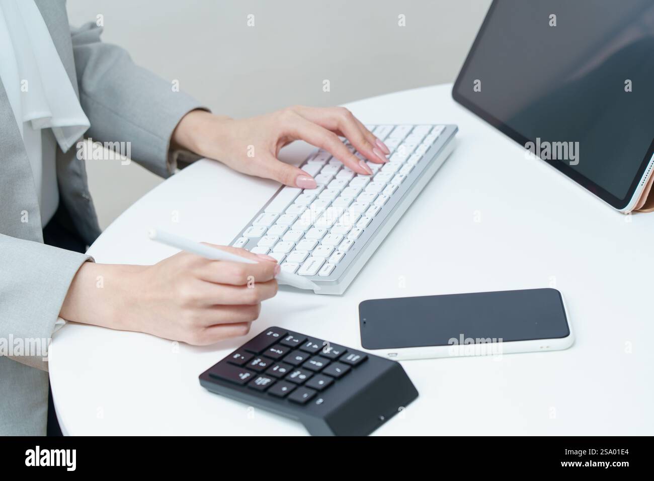 Woman's hand on computer keyboard Stock Photo - Alamy
